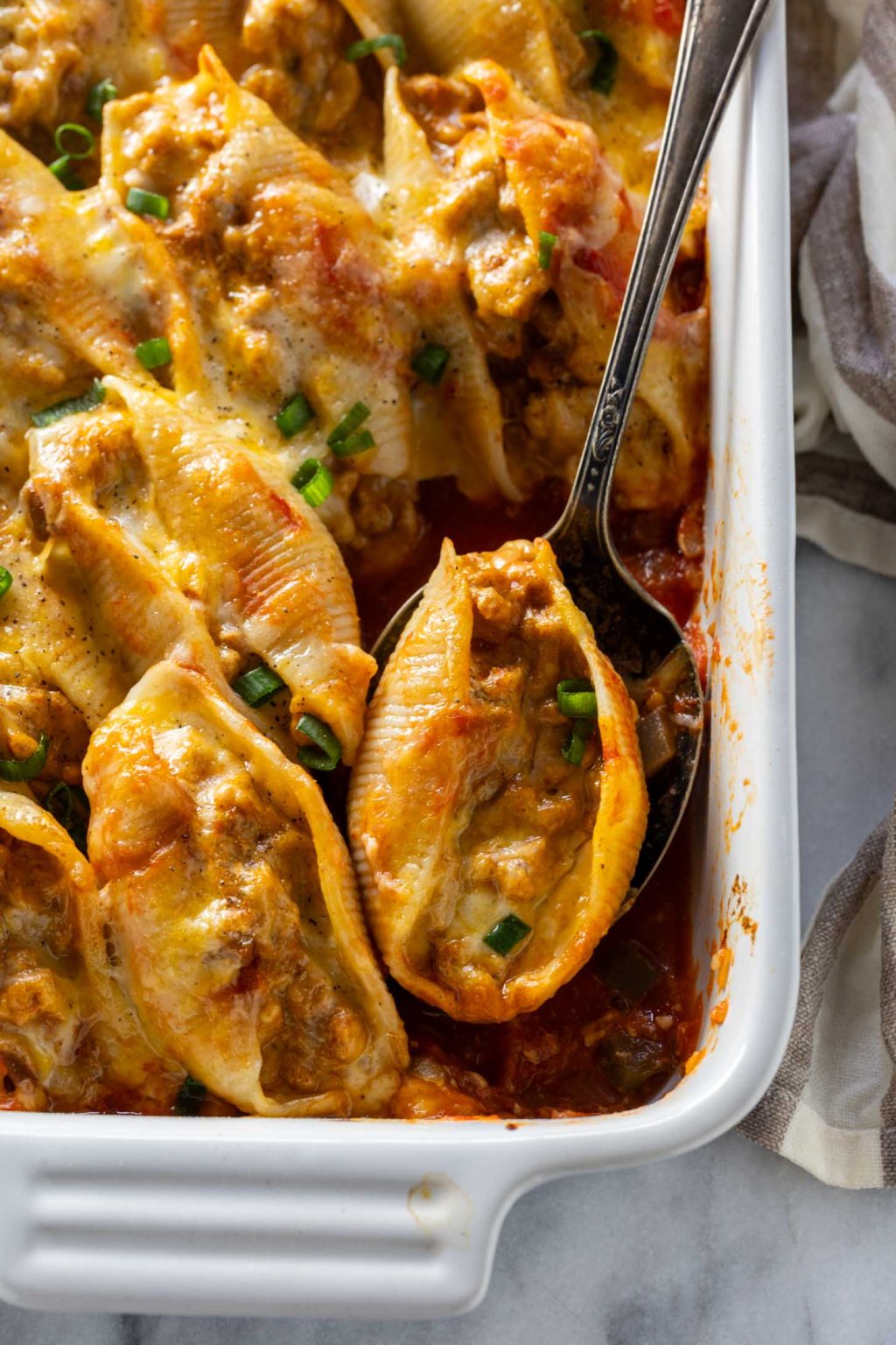Cheesy Taco Stuffed Shells • Baked by Rachel
